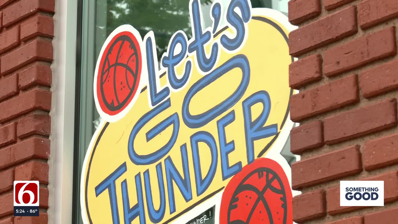 Tulsa artist paints downtown windows to celebrate Thunder's NBA Finals run