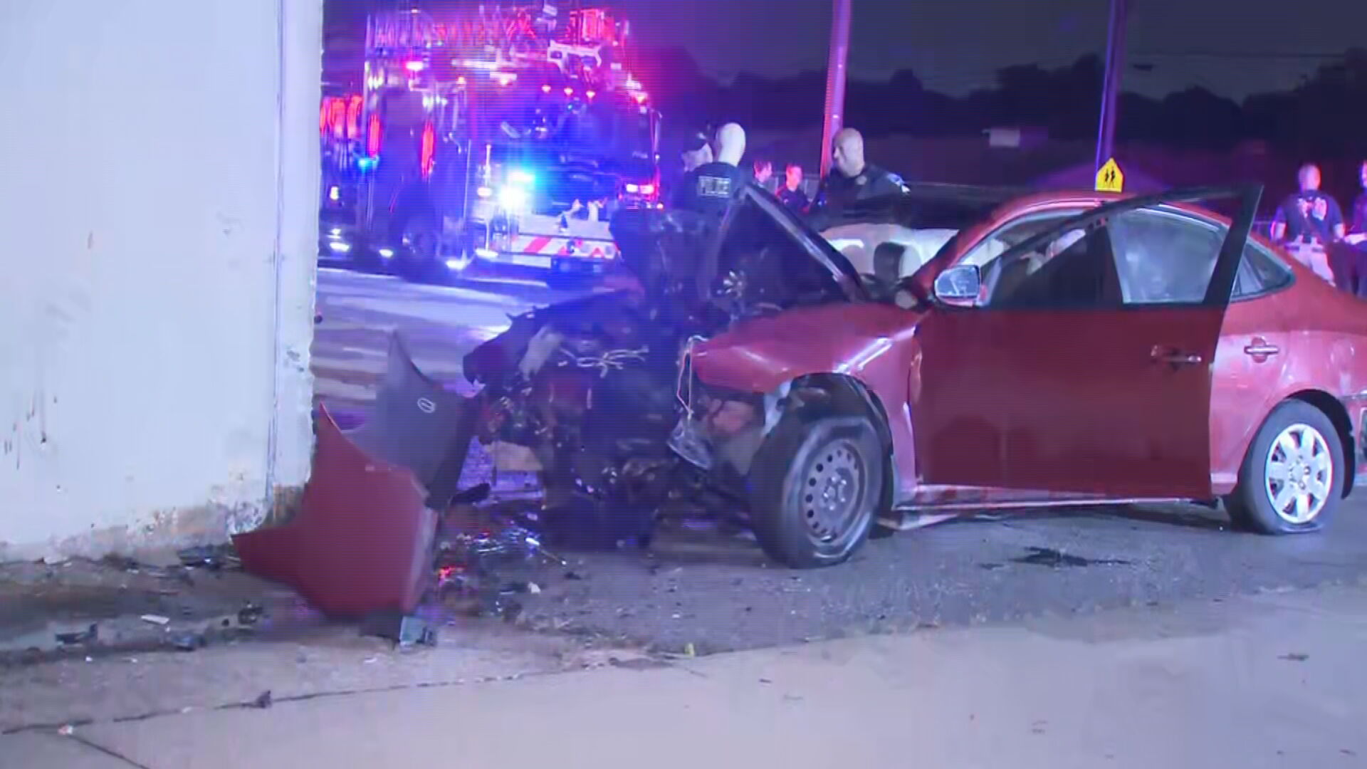 1 dead after car crashes into building, catches fire